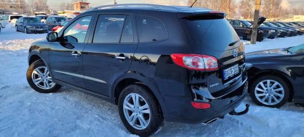 Melns Hyundai Santa Fe 2010 Rīga, ar dzinēja tilpumu 2.20 L un nobraukumu 259 tūkst. km par 8900 €, foto 4 vietnē AUTOMOTO.COM.LV