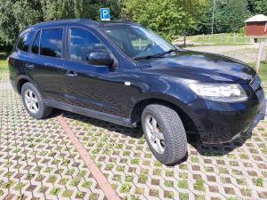 Black Hyundai Santa Fe 2010 in Joniskis, with an engine capacity of 2.20 L and mileage of 268 thousand km for 4000 €, photo 13 on AUTOMOTO.COM.LV