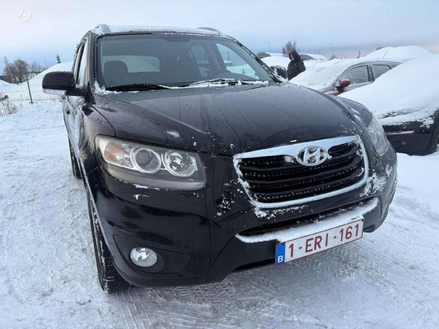 Melns Hyundai Santa Fe 2011 Tauragė, ar dzinēja tilpumu 2.00 L un nobraukumu 259 tūkst. km par 5200 €, foto 8 vietnē AUTOMOTO.COM.LV