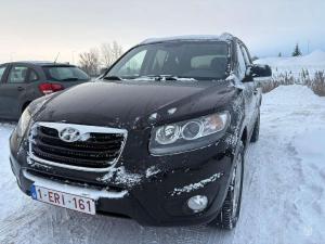 Melns Hyundai Santa Fe 2011 Tauragė, ar dzinēja tilpumu 2.00 L un nobraukumu 259 tūkst. km par 5200 €, foto 9 vietnē AUTOMOTO.COM.LV
