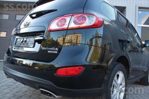 Melns Hyundai Santa Fe 2011 Rīga, ar dzinēja tilpumu 2.20 L un nobraukumu 0 tūkst. km par 7490 €, foto 13 vietnē AUTOMOTO.COM.LV