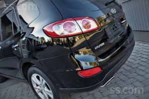 Melns Hyundai Santa Fe 2011 Rīga, ar dzinēja tilpumu 2.20 L un nobraukumu 0 tūkst. km par 7490 €, foto 16 vietnē AUTOMOTO.COM.LV