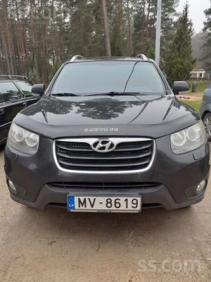 Melns Hyundai Santa Fe 2011 Rīga, ar dzinēja tilpumu 2.20 L un nobraukumu 273 tūkst. km par 6990 €, foto  vietnē AUTOMOTO.COM.LV