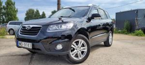 Black Hyundai Santa Fe 2011 in Riga, with an engine capacity of 2.20 L and mileage of 230 thousand km for 6500 €, photo  on AUTOMOTO.COM.LV