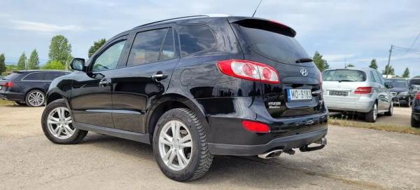 Melns Hyundai Santa Fe 2011 Rīga, ar dzinēja tilpumu 2.20 L un nobraukumu 230 tūkst. km par 6500 €, foto 6 vietnē AUTOMOTO.COM.LV