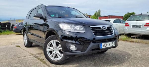 Melns Hyundai Santa Fe 2011 Rīga, ar dzinēja tilpumu 2.20 L un nobraukumu 230 tūkst. km par 6500 €, foto 7 vietnē AUTOMOTO.COM.LV