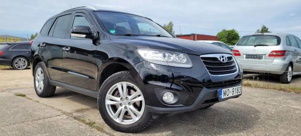 Melns Hyundai Santa Fe 2011 Rīga, ar dzinēja tilpumu 2.20 L un nobraukumu 230 tūkst. km par 6500 €, foto 8 vietnē AUTOMOTO.COM.LV