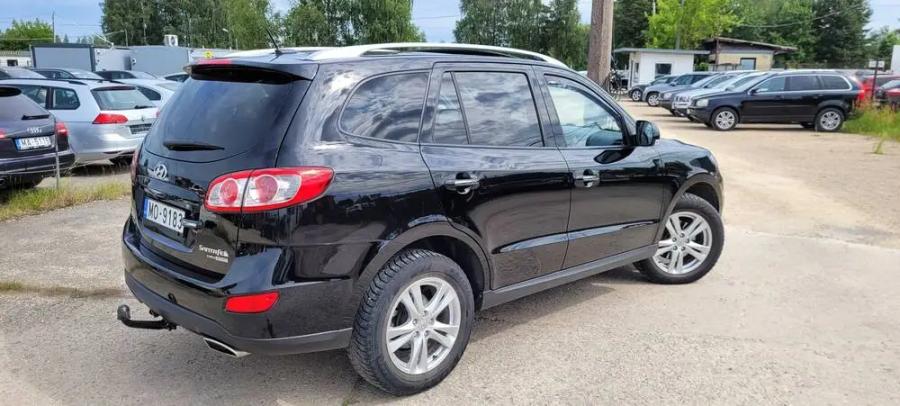 Melns Hyundai Santa Fe 2011 Rīga, ar dzinēja tilpumu 2.20 L un nobraukumu 230 tūkst. km par 6500 €, foto 11 vietnē AUTOMOTO.COM.LV