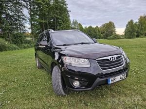 Melns Hyundai Santa Fe 2011 Madona, ar dzinēja tilpumu 2.20 L un nobraukumu 349 tūkst. km par 5700 €, foto  vietnē AUTOMOTO.COM.LV