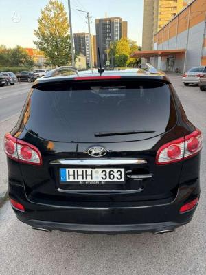 Melns Hyundai Santa Fe 2011 Kauņa, ar dzinēja tilpumu 2.20 L un nobraukumu 155 tūkst. km par 7800 €, foto 5 vietnē AUTOMOTO.COM.LV