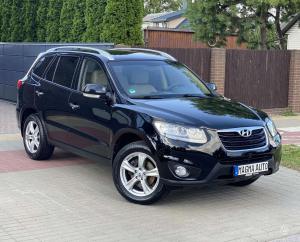 Black Hyundai Santa Fe 2011 in Marijampole, with an engine capacity of 2.20 L and mileage of 237 thousand km for 6999 €, photo 3 on AUTOMOTO.COM.LV