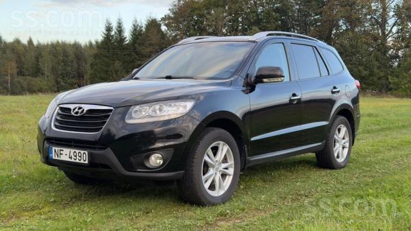 Melns Hyundai Santa Fe 2011 Rīga, ar dzinēja tilpumu 2.20 L un nobraukumu 315 tūkst. km par 4900 €, foto 1 vietnē AUTOMOTO.COM.LV
