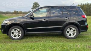 Melns Hyundai Santa Fe 2011 Rīga, ar dzinēja tilpumu 2.20 L un nobraukumu 315 tūkst. km par 4900 €, foto 3 vietnē AUTOMOTO.COM.LV
