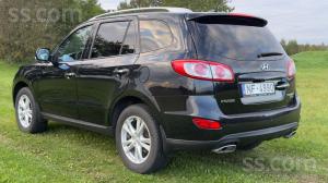 Melns Hyundai Santa Fe 2011 Rīga, ar dzinēja tilpumu 2.20 L un nobraukumu 315 tūkst. km par 4900 €, foto 4 vietnē AUTOMOTO.COM.LV