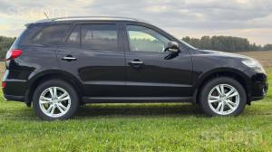 Melns Hyundai Santa Fe 2011 Rīga, ar dzinēja tilpumu 2.20 L un nobraukumu 315 tūkst. km par 4900 €, foto 5 vietnē AUTOMOTO.COM.LV