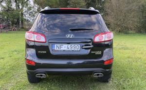 Melns Hyundai Santa Fe 2011 Rīga, ar dzinēja tilpumu 2.20 L un nobraukumu 315 tūkst. km par 4900 €, foto 7 vietnē AUTOMOTO.COM.LV