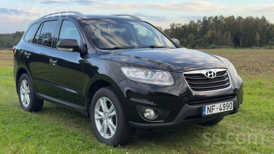 Melns Hyundai Santa Fe 2011 Rīga, ar dzinēja tilpumu 2.20 L un nobraukumu 315 tūkst. km par 4900 €, foto 8 vietnē AUTOMOTO.COM.LV