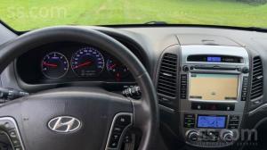 Melns Hyundai Santa Fe 2011 Rīga, ar dzinēja tilpumu 2.20 L un nobraukumu 315 tūkst. km par 4900 €, foto 12 vietnē AUTOMOTO.COM.LV