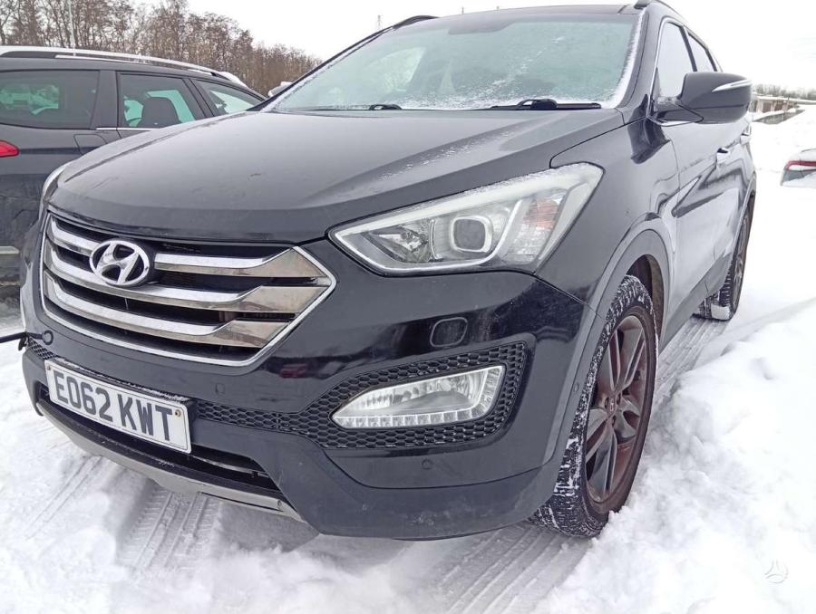 Black Hyundai Santa Fe 2012 in Kaunas, with an engine capacity of 2.20 L and mileage of 130 thousand km for 3250 €, photo 2 on AUTOMOTO.COM.LV