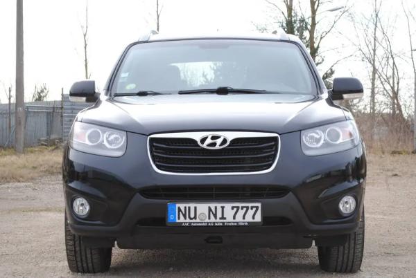 Melns Hyundai Santa Fe 2012 Rīga, ar dzinēja tilpumu 2.20 L un nobraukumu 225 tūkst. km par 7990 €, foto 5 vietnē AUTOMOTO.COM.LV