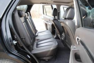 Black Hyundai Santa Fe 2012 in Riga, with an engine capacity of 2.20 L and mileage of 225 thousand km for 7990 €, photo 11 on AUTOMOTO.COM.LV