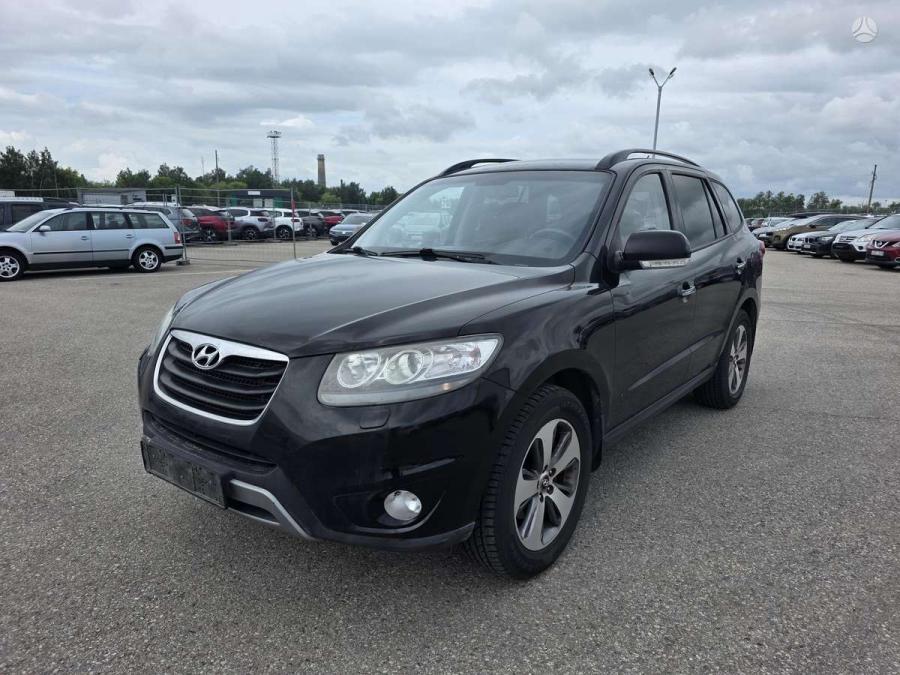 Melns Hyundai Santa Fe 2012 Marijampole, ar dzinēja tilpumu 2.20 L un nobraukumu 318 tūkst. km par 4300 €, foto 1 vietnē AUTOMOTO.COM.LV