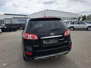 Melns Hyundai Santa Fe 2012 Marijampole, ar dzinēja tilpumu 2.20 L un nobraukumu 318 tūkst. km par 4300 €, foto 10 vietnē AUTOMOTO.COM.LV