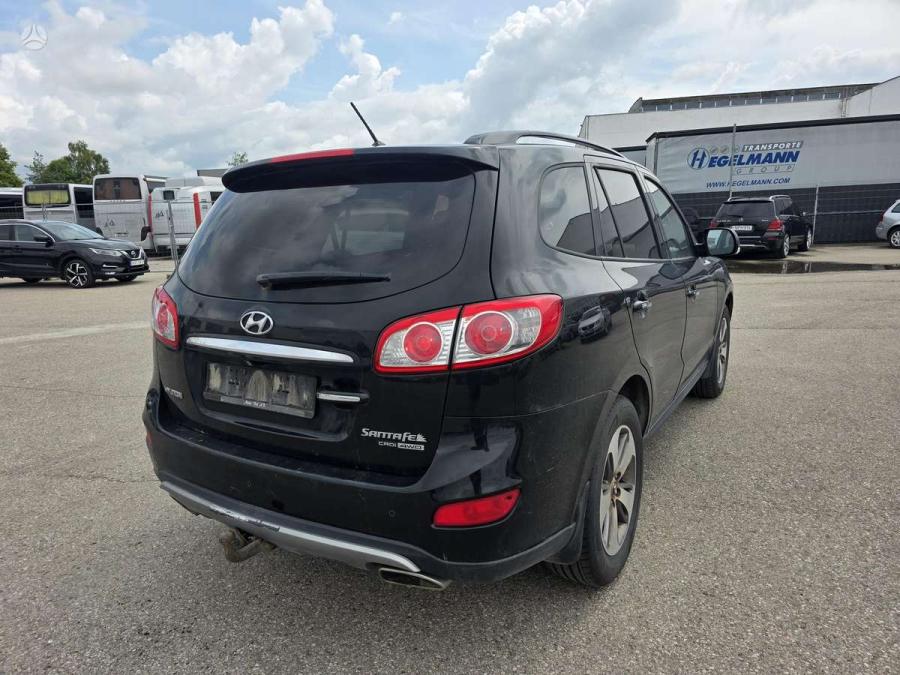 Melns Hyundai Santa Fe 2012 Marijampole, ar dzinēja tilpumu 2.20 L un nobraukumu 318 tūkst. km par 4300 €, foto 12 vietnē AUTOMOTO.COM.LV