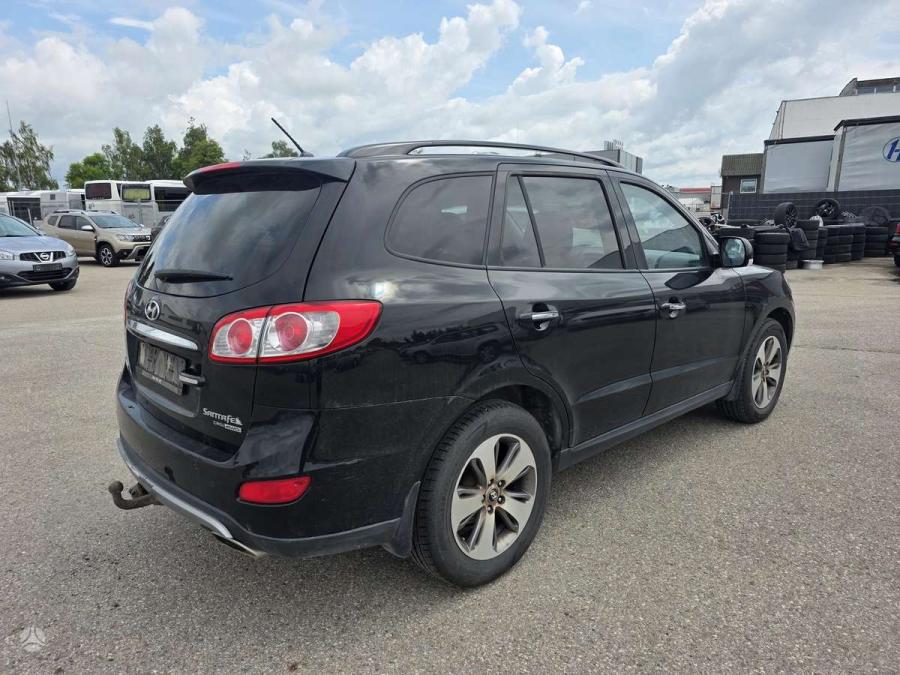 Melns Hyundai Santa Fe 2012 Marijampole, ar dzinēja tilpumu 2.20 L un nobraukumu 318 tūkst. km par 4300 €, foto 13 vietnē AUTOMOTO.COM.LV