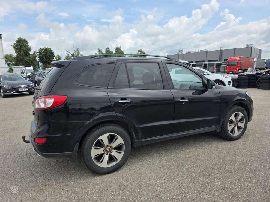 Melns Hyundai Santa Fe 2012 Marijampole, ar dzinēja tilpumu 2.20 L un nobraukumu 318 tūkst. km par 4300 €, foto 14 vietnē AUTOMOTO.COM.LV