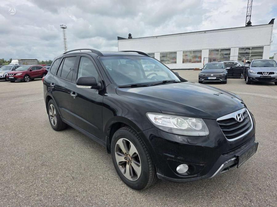 Melns Hyundai Santa Fe 2012 Marijampole, ar dzinēja tilpumu 2.20 L un nobraukumu 318 tūkst. km par 4300 €, foto 20 vietnē AUTOMOTO.COM.LV