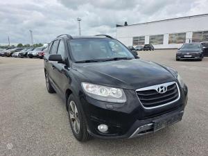 Melns Hyundai Santa Fe 2012 Marijampole, ar dzinēja tilpumu 2.20 L un nobraukumu 318 tūkst. km par 4300 €, foto 21 vietnē AUTOMOTO.COM.LV