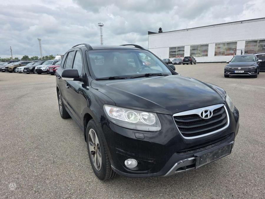 Melns Hyundai Santa Fe 2012 Marijampole, ar dzinēja tilpumu 2.20 L un nobraukumu 318 tūkst. km par 4300 €, foto 21 vietnē AUTOMOTO.COM.LV