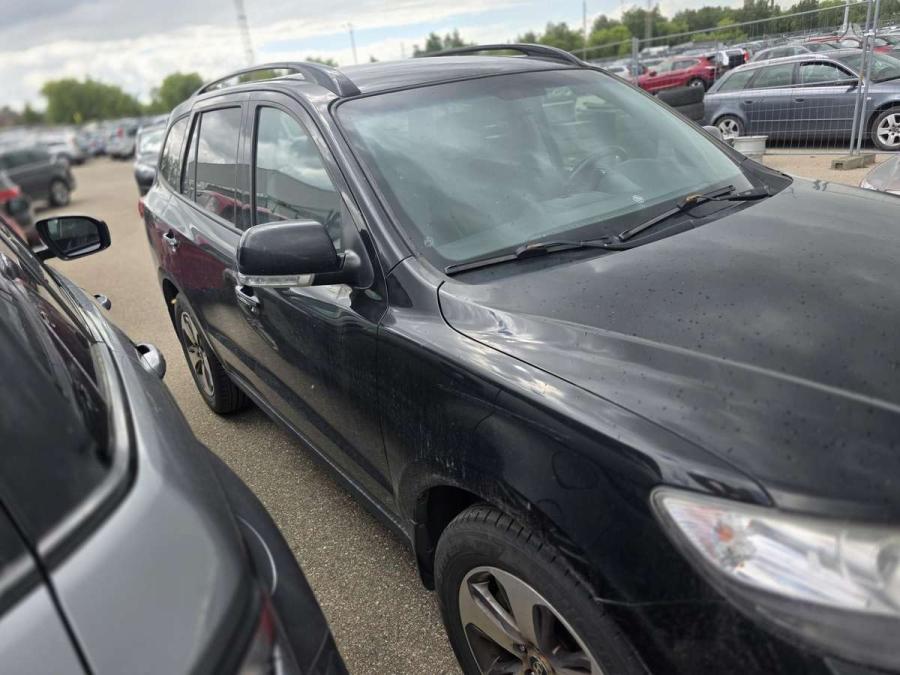 Melns Hyundai Santa Fe 2012 Marijampole, ar dzinēja tilpumu 2.20 L un nobraukumu 318 tūkst. km par 4350 €, foto 10 vietnē AUTOMOTO.COM.LV