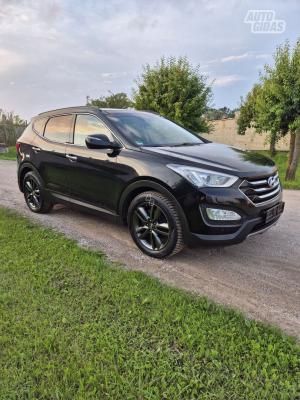 Melns Hyundai Santa Fe 2012 Vilkaviškis, ar dzinēja tilpumu 2.20 L un nobraukumu 259 tūkst. km par 8300 €, foto  vietnē AUTOMOTO.COM.LV