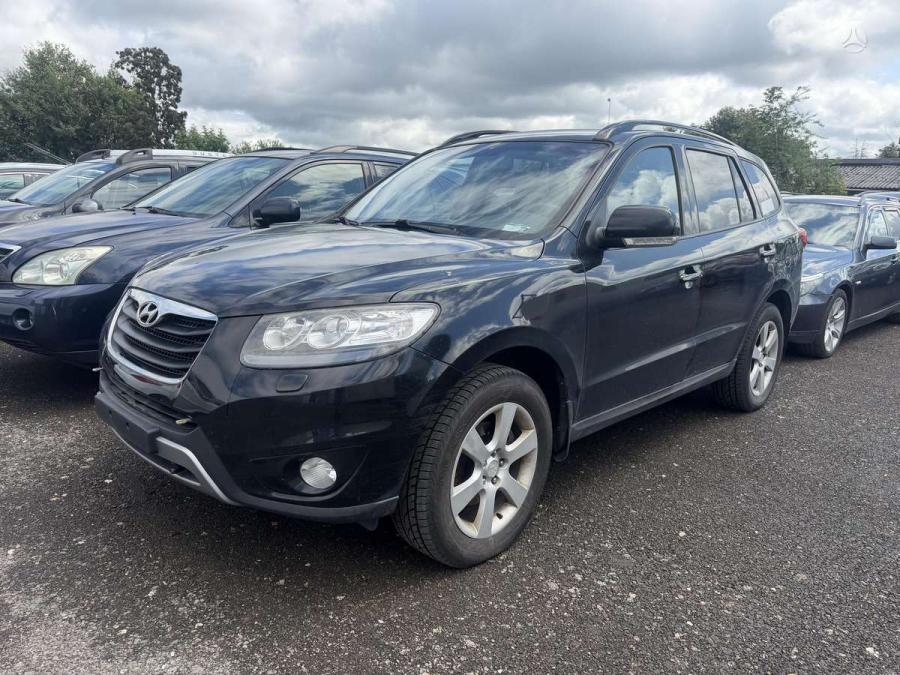 Melns Hyundai Santa Fe 2012 Kauņa, ar dzinēja tilpumu 2.20 L un nobraukumu 225 tūkst. km par 3450 €, foto 1 vietnē AUTOMOTO.COM.LV