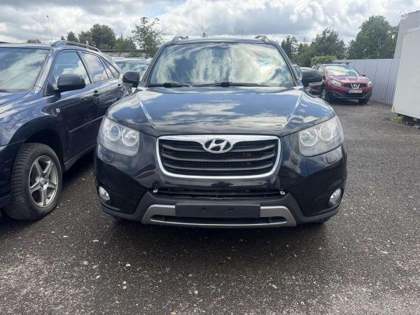 Melns Hyundai Santa Fe 2012 Kauņa, ar dzinēja tilpumu 2.20 L un nobraukumu 225 tūkst. km par 3450 €, foto 2 vietnē AUTOMOTO.COM.LV