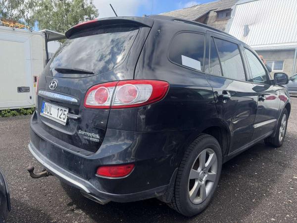 Melns Hyundai Santa Fe 2012 Kauņa, ar dzinēja tilpumu 2.20 L un nobraukumu 225 tūkst. km par 3450 €, foto 3 vietnē AUTOMOTO.COM.LV
