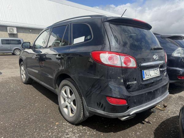 Melns Hyundai Santa Fe 2012 Kauņa, ar dzinēja tilpumu 2.20 L un nobraukumu 225 tūkst. km par 3450 €, foto 4 vietnē AUTOMOTO.COM.LV