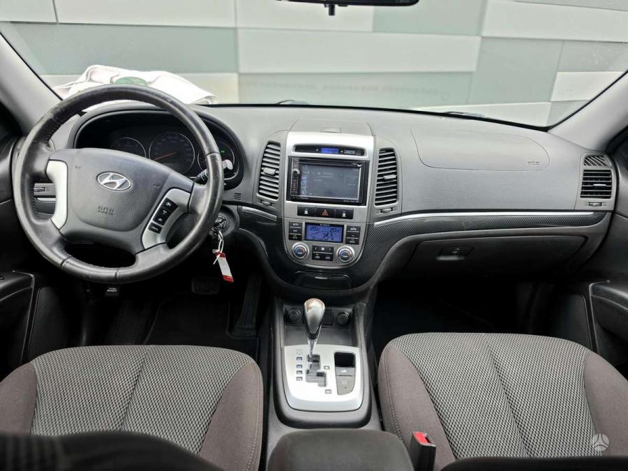Melns Hyundai Santa Fe 2012 Panevēža, ar dzinēja tilpumu 2.20 L un nobraukumu 270 tūkst. km par 5350 €, foto 16 vietnē AUTOMOTO.COM.LV