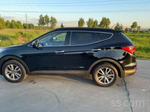 Melns Hyundai Santa Fe 2012 Rīga, ar dzinēja tilpumu 2.20 L un nobraukumu 220 tūkst. km par 12000 €, foto 6 vietnē AUTOMOTO.COM.LV
