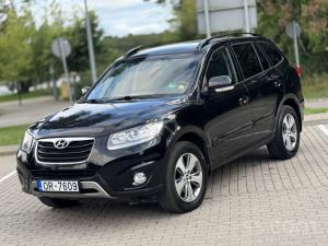 Hyundai Santa Fe 2012 Jūrmala vietnē Melns Hyundai Santa Fe 2012 Jūrmala, ar dzinēja tilpumu 2.20 L un nobraukumu 274 tūkst. km par 5990 €, foto 1 vietnē AUTOMOTO.COM.LV