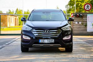 Black Hyundai Santa Fe 2013 in Jelgava, with an engine capacity of 2.20 L and mileage of 0 thousand km for 14800 €, photo 2 on AUTOMOTO.COM.LV