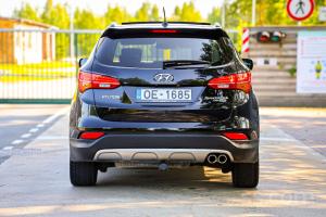 Black Hyundai Santa Fe 2013 in Jelgava, with an engine capacity of 2.20 L and mileage of 0 thousand km for 14800 €, photo 6 on AUTOMOTO.COM.LV