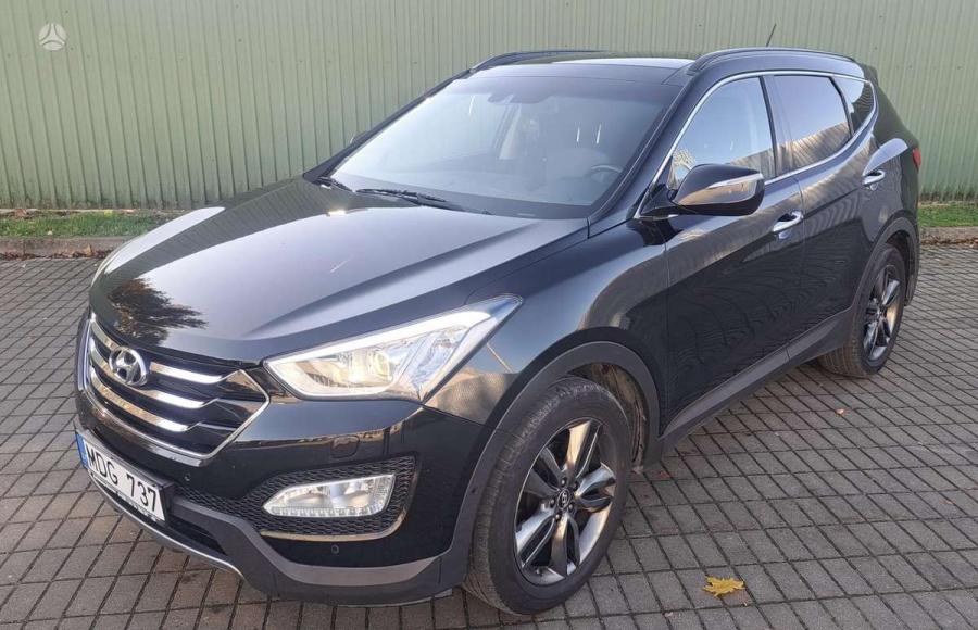 Black Hyundai Santa Fe 2013 in Marijampole, with an engine capacity of 2.20 L and mileage of 169 thousand km for 10500 €, photo 7 on AUTOMOTO.COM.LV
