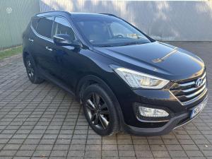 Black Hyundai Santa Fe 2013 in Marijampole, with an engine capacity of 2.20 L and mileage of 169 thousand km for 10500 €, photo 9 on AUTOMOTO.COM.LV