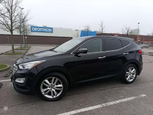 Melns Hyundai Santa Fe 2013 Klaipėda, ar dzinēja tilpumu 2.00 L un nobraukumu 176 tūkst. km par 9000 €, foto  vietnē AUTOMOTO.COM.LV
