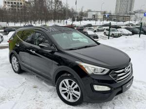 Black Hyundai Santa Fe 2013 in Vilnius, with an engine capacity of 2.00 L and mileage of 132 thousand km for 8500 €, photo 3 on AUTOMOTO.COM.LV
