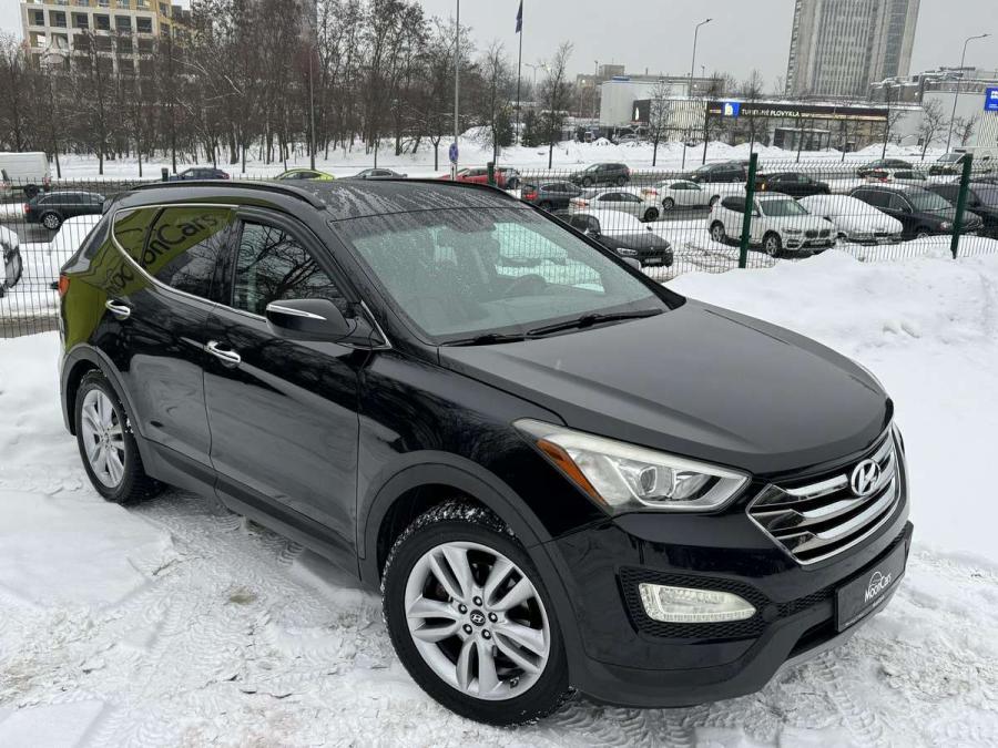 Black Hyundai Santa Fe 2013 in Vilnius, with an engine capacity of 2.00 L and mileage of 132 thousand km for 8500 €, photo 3 on AUTOMOTO.COM.LV