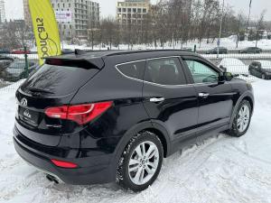 Black Hyundai Santa Fe 2013 in Vilnius, with an engine capacity of 2.00 L and mileage of 132 thousand km for 8500 €, photo 5 on AUTOMOTO.COM.LV